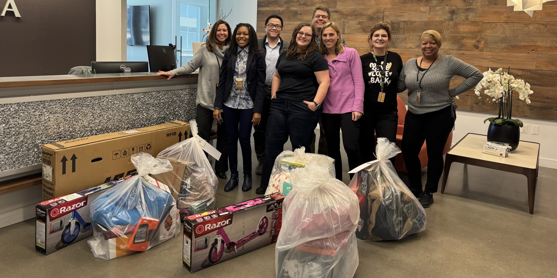 Engineering Elves Helping to Fill Santa's Sleigh - Angel Tree at SK&A